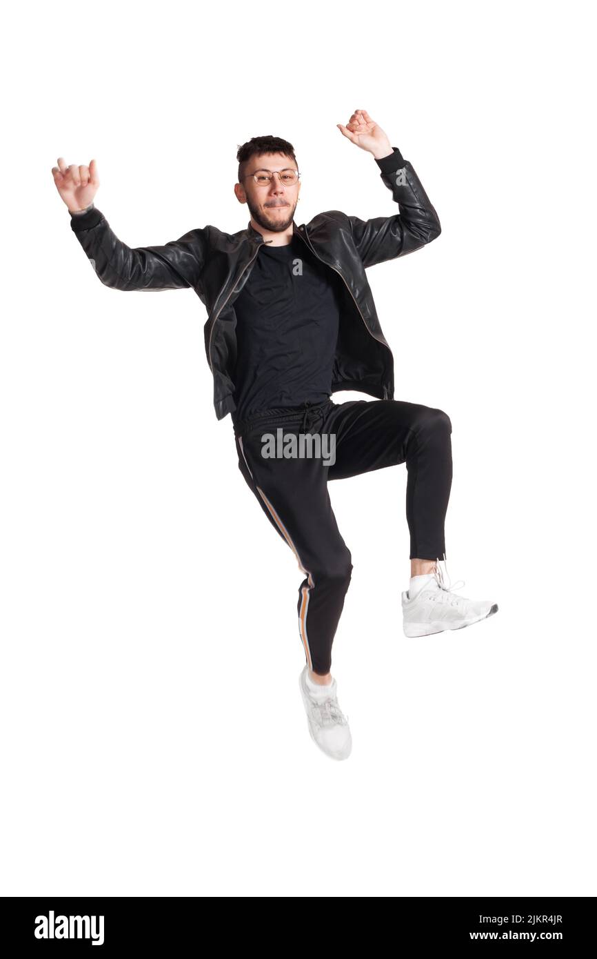 Full-length photo of a funny guy dancing in studio isolated on white ...