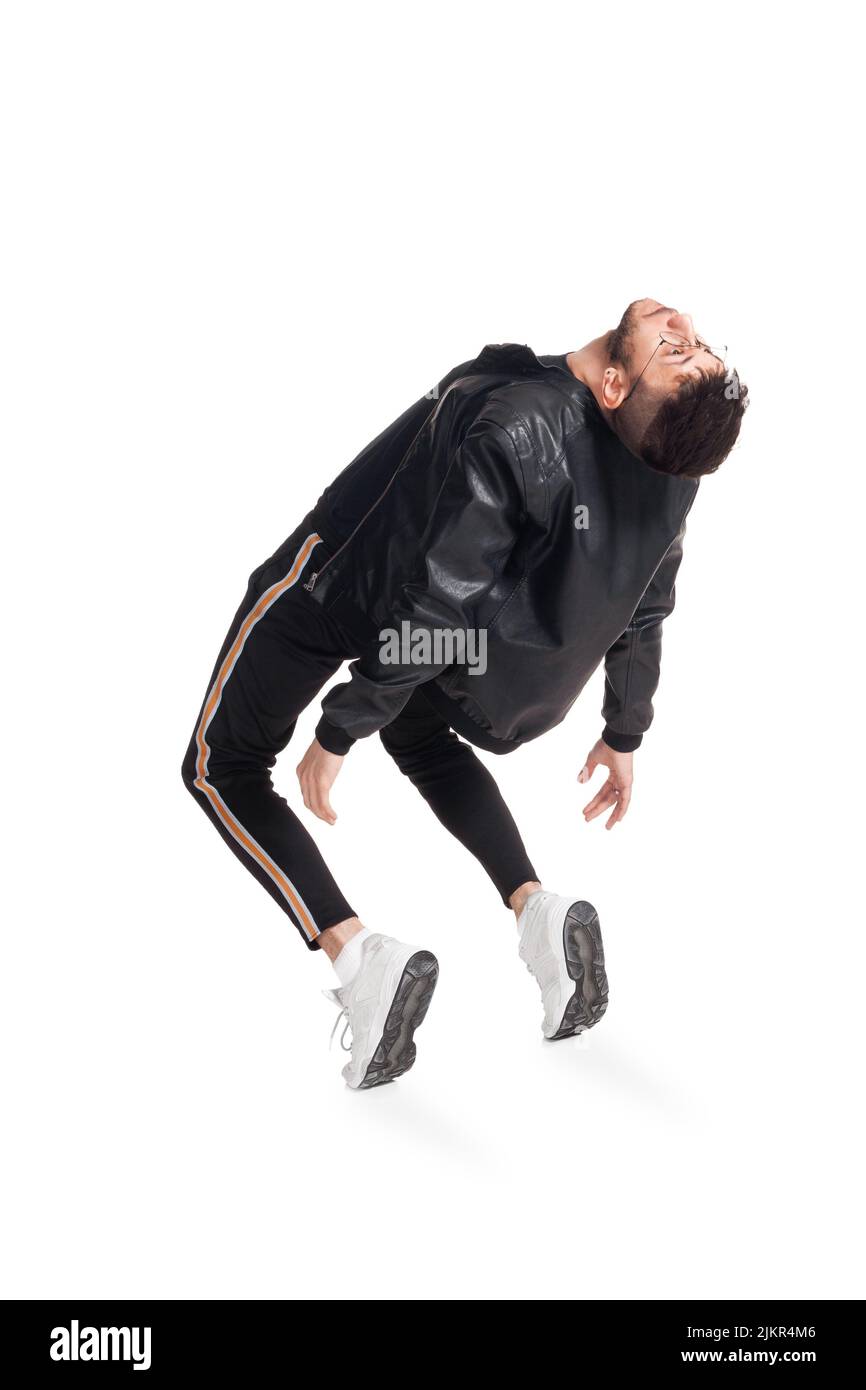 Full-length photo of a funny guy dancing in studio isolated on white ...