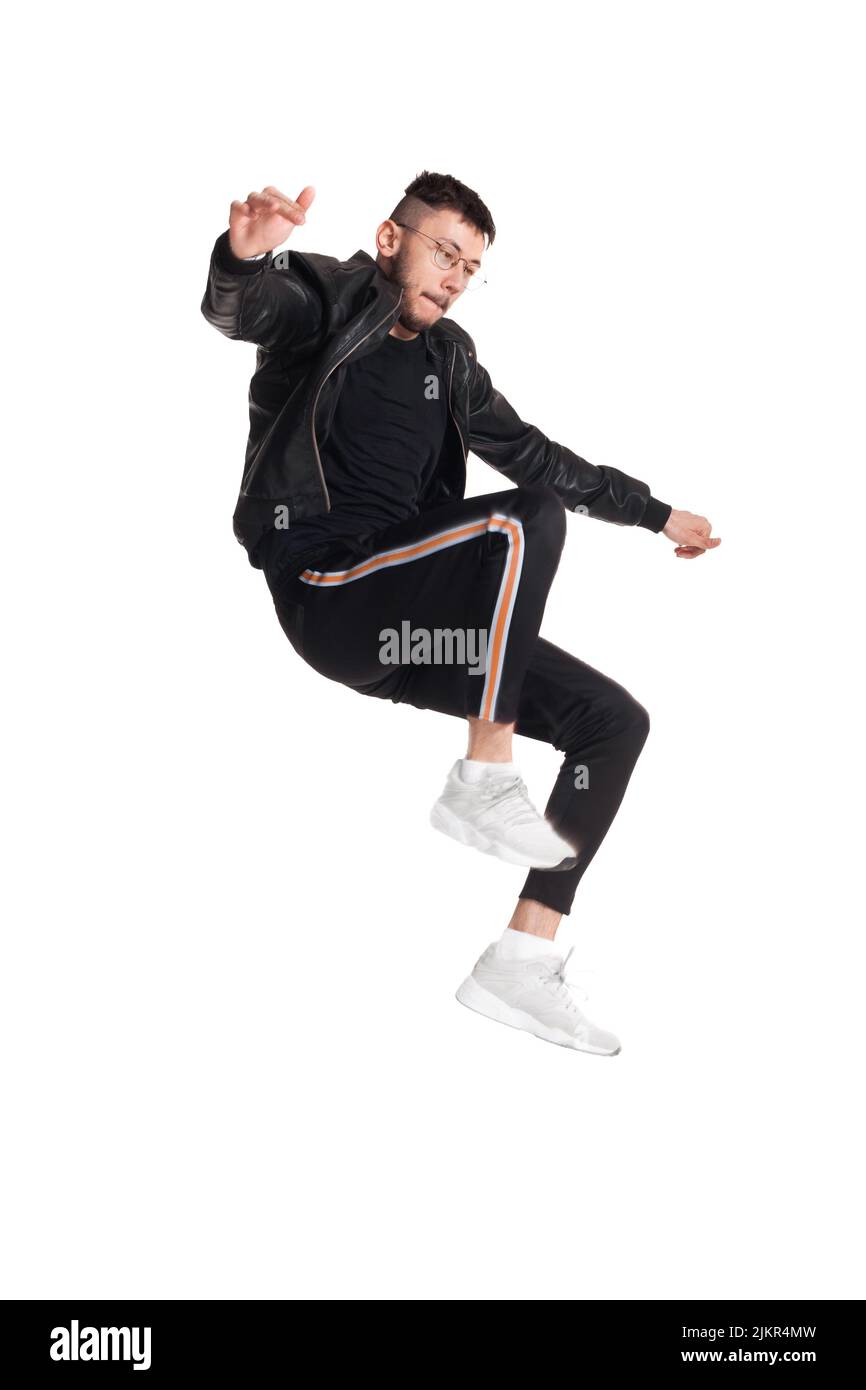 Full-length photo of a funny guy dancing in studio isolated on white ...