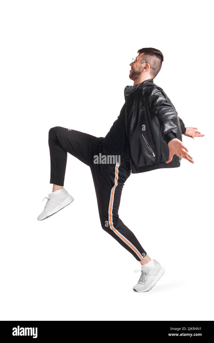 Full-length photo of a funny guy dancing in studio isolated on white ...