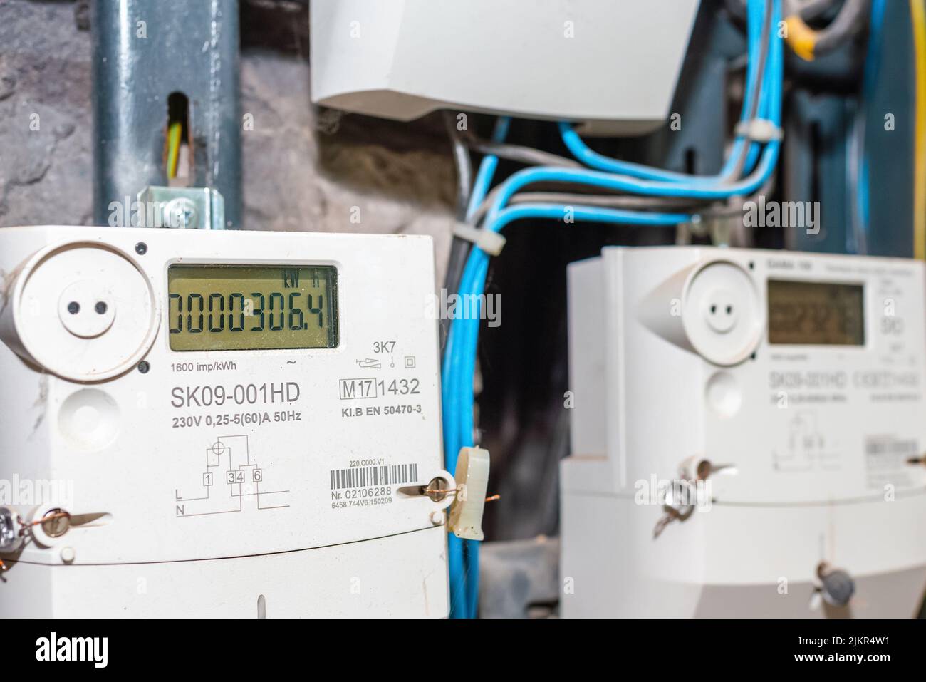 Two smart electric power meter counter measuring power usage.Close-up ...