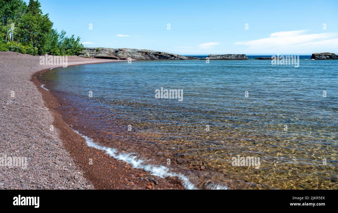 Bright, cherry day at Horseshoe Bay in Lake Superior, near Copper ...