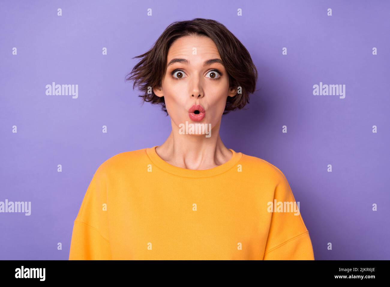 Portrait of shocked young person pouted lips look speechless cant ...