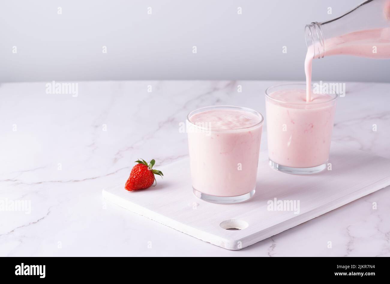 Pouring kefir buttermilk yogurt hi-res stock photography and images - Alamy