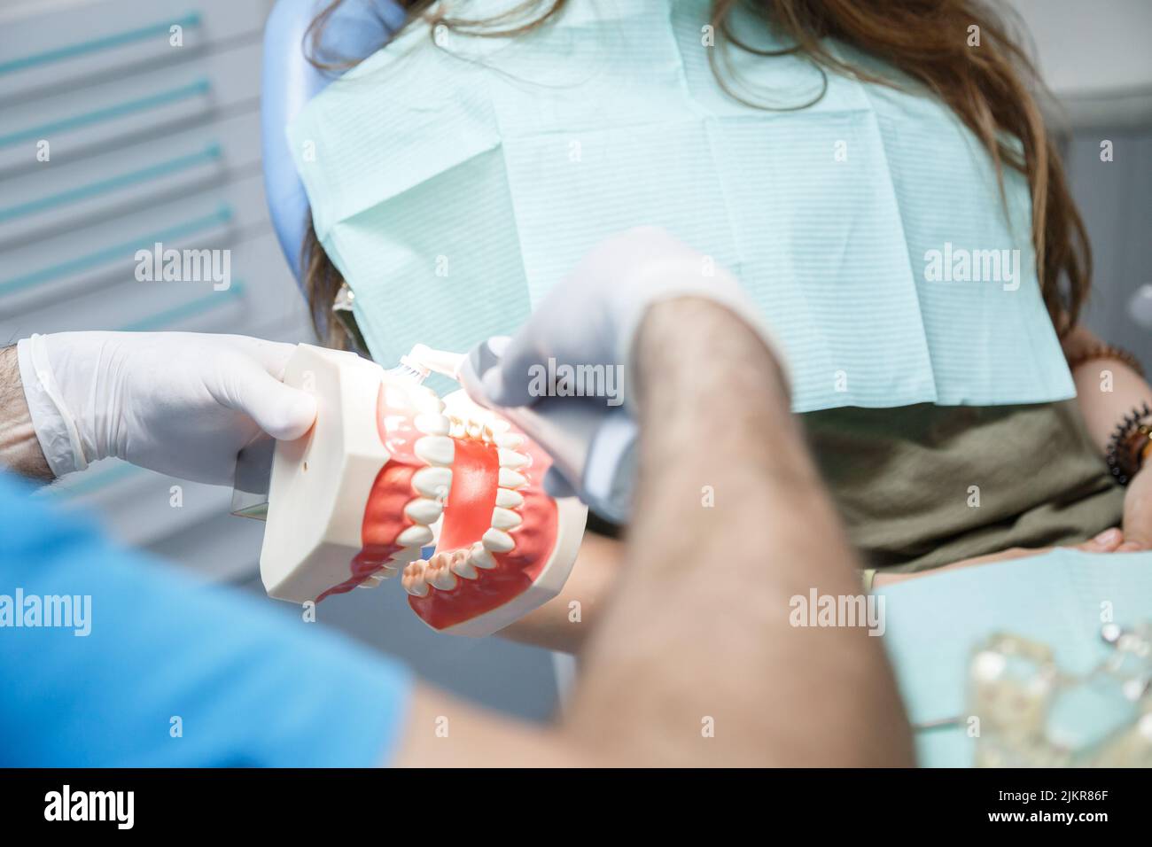 Professional doctor demonstration process of healthy teeth brushing to ...