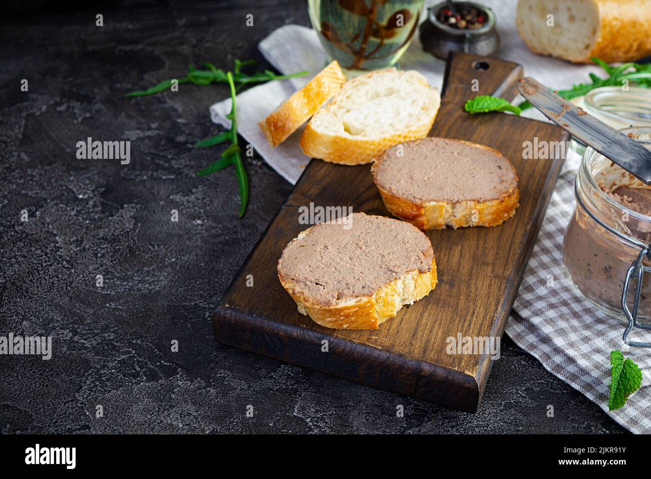Sandwich with chicken liver pate on dark background Stock Photo - Alamy