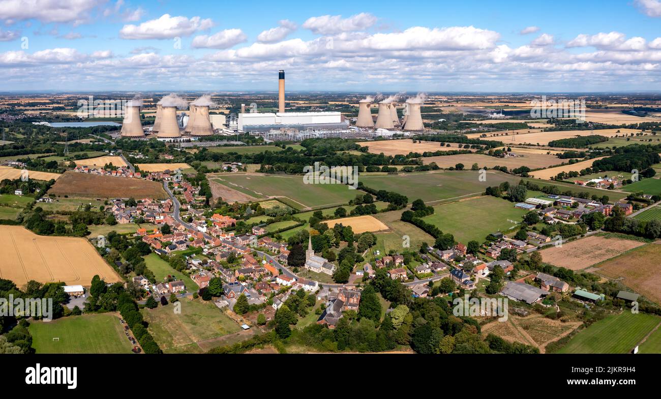 Aerial landscape view of Drax Power Station in North Yorkshire with smoking chimneys and cooling ...