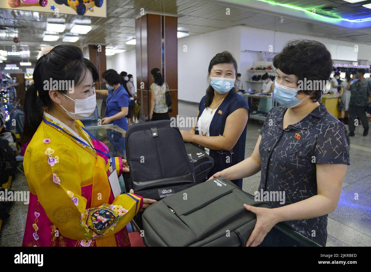 A consumer goods fair is held at a department store in Pyongyang on Aug ...