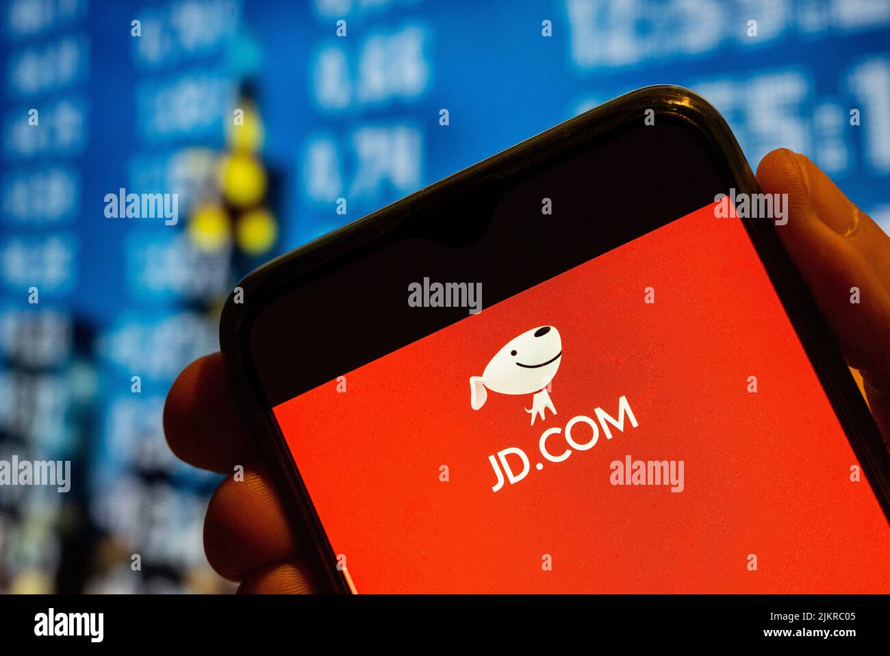 In this photo illustration, the Chinese e-commerce company JD.com logo ...