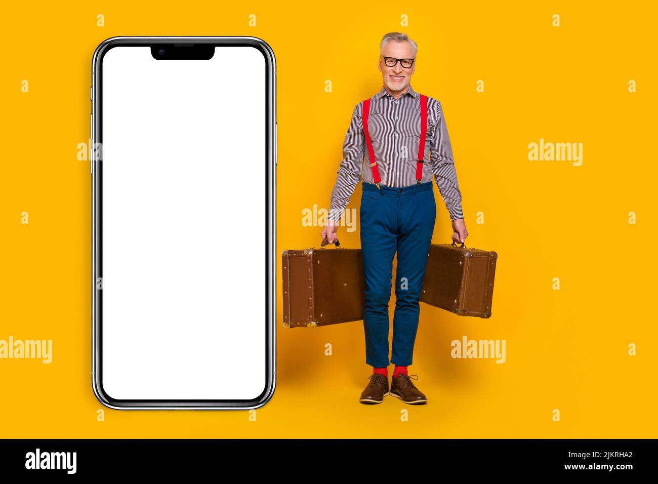 Full length body size view of attractive cheery grey-haired man holding ...