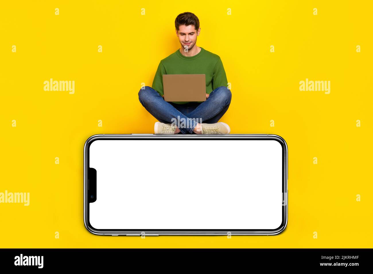 Full length body size view of attractive focused guy using laptop ...