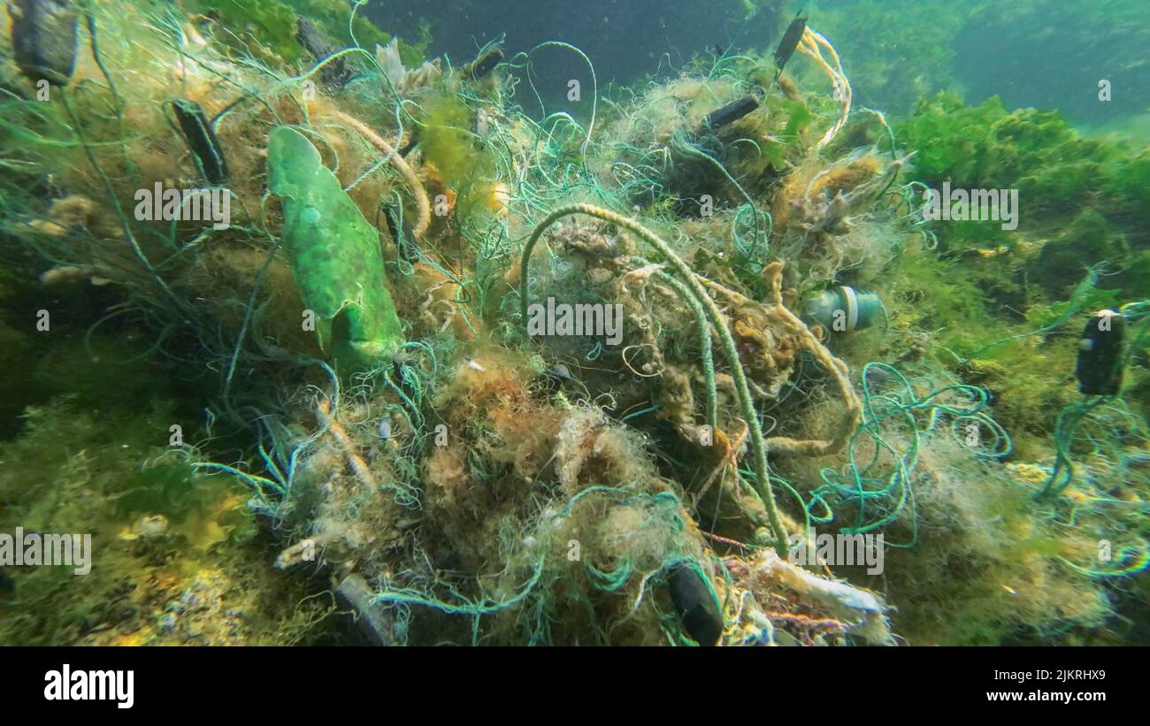 Lost fishing gear lies underwater on the seabed. Problem of ghost gear ...