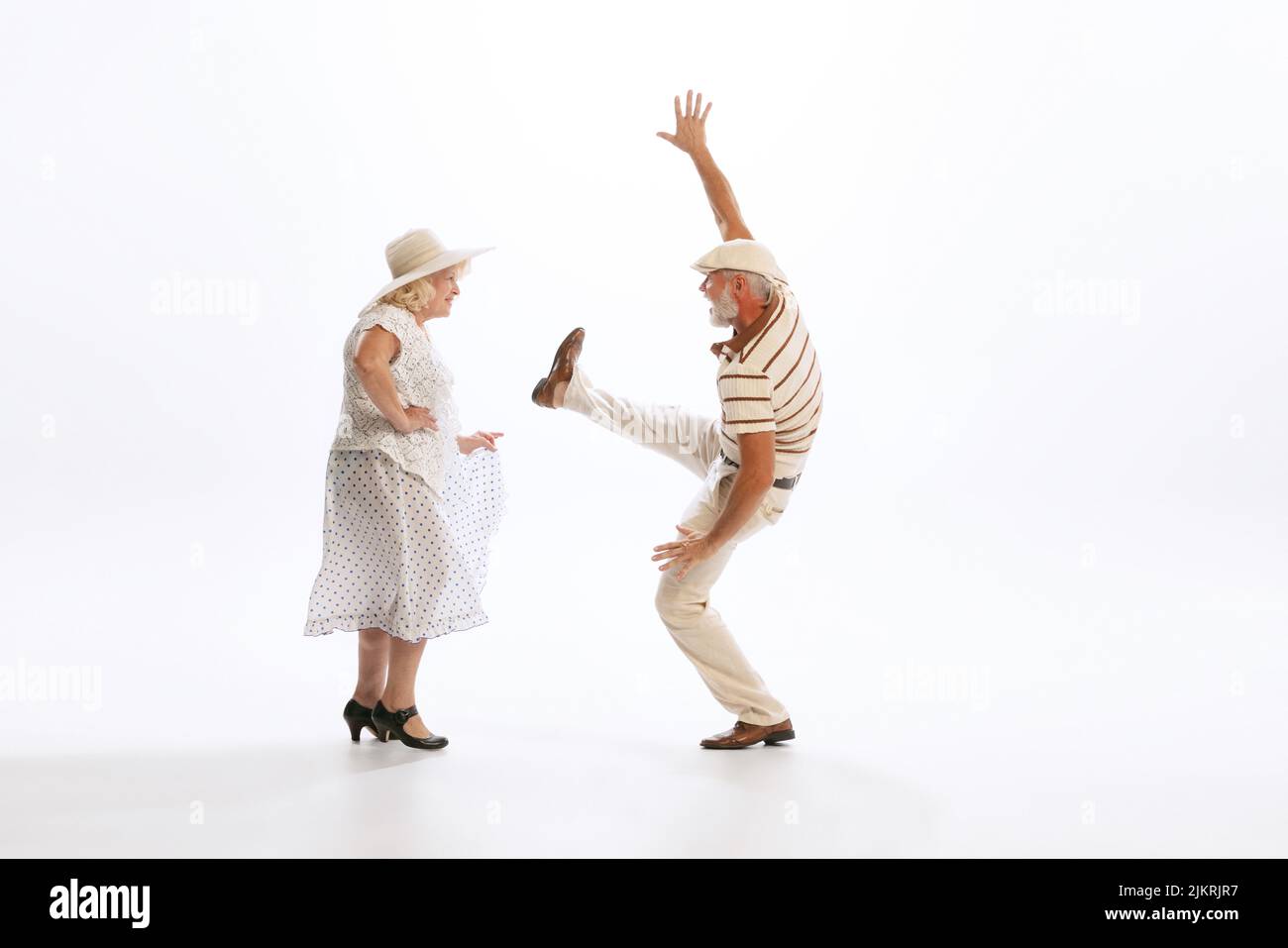 Portrait of retro style dancers, senior man and woman in vintage attire ...