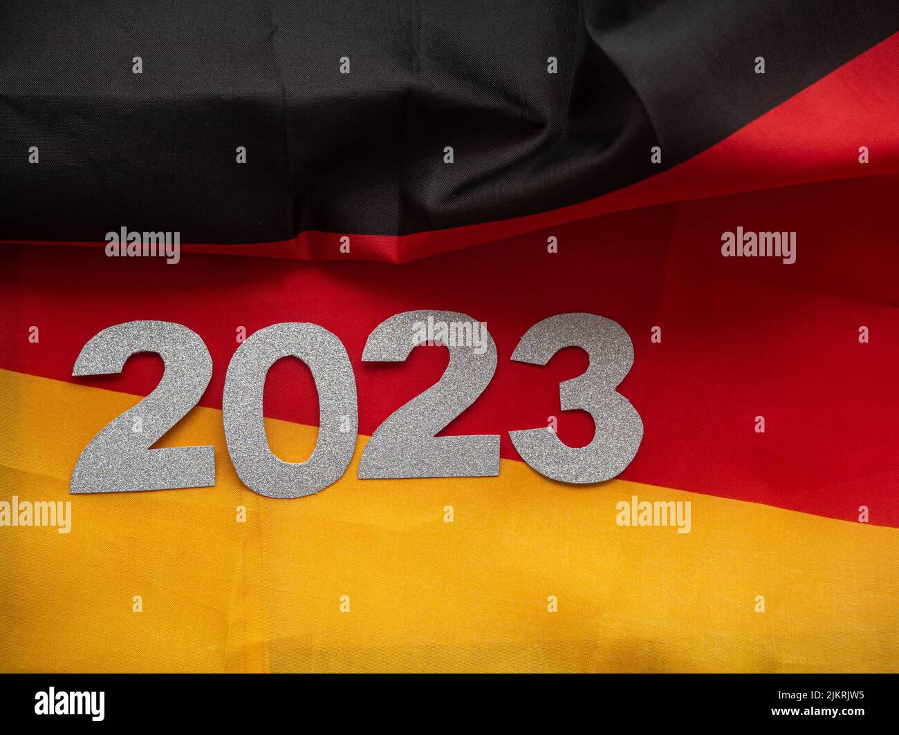 2023 on the background of german flags Stock Photo - Alamy