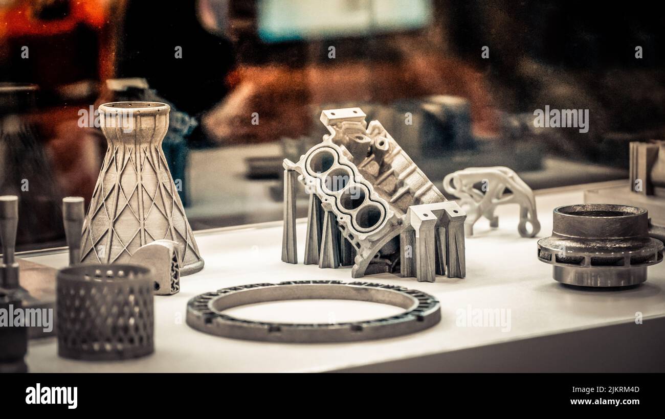 Man is holding object printed on metal 3d printer. Object printed in ...