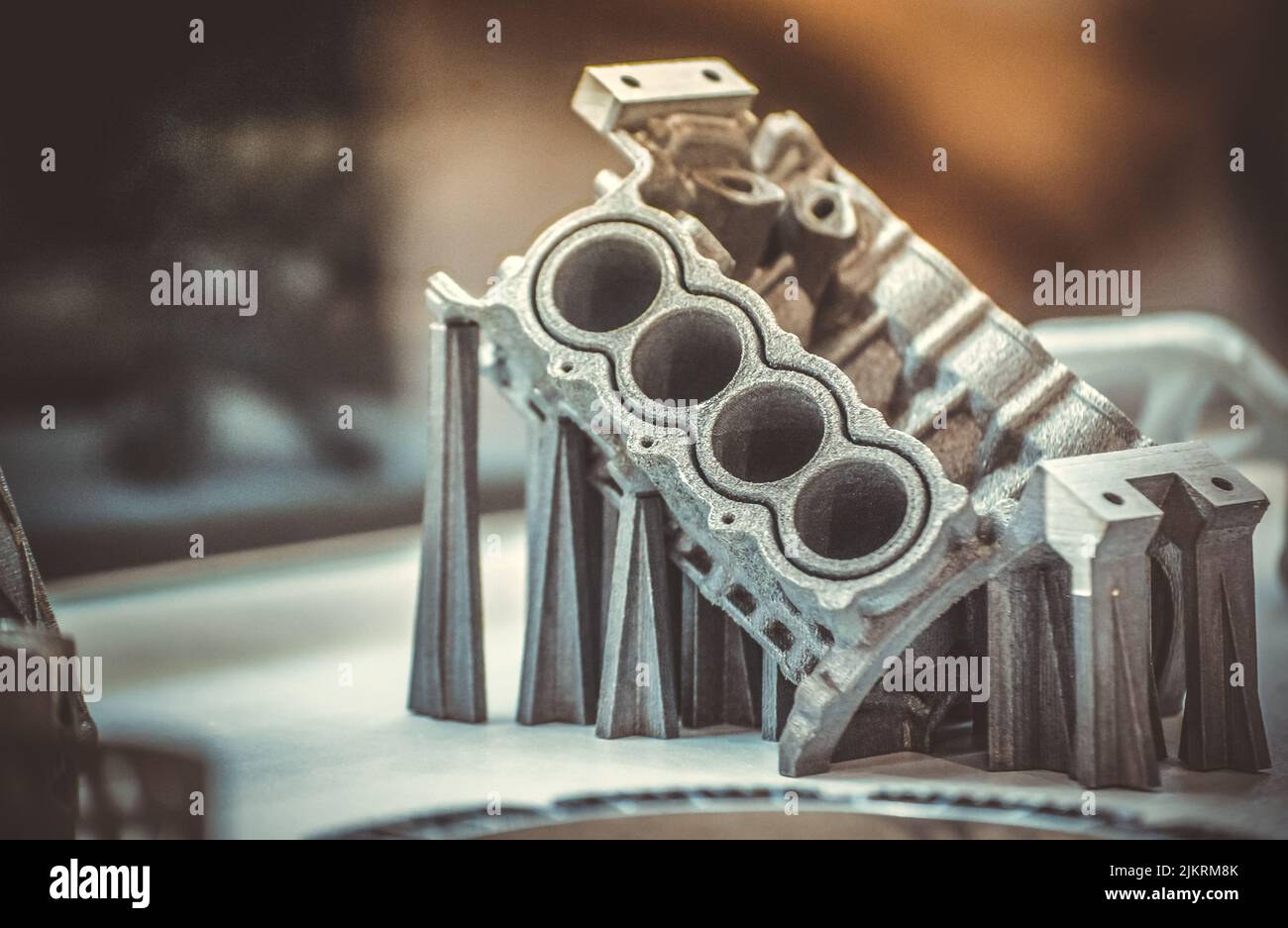 Man is holding object printed on metal 3d printer. Object printed in ...