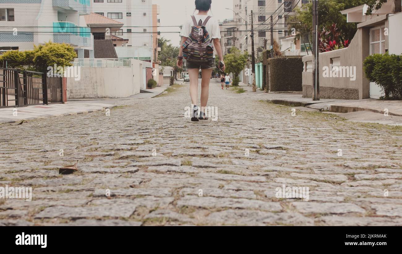 Woman young walking street legs hi-res stock photography and images - Alamy