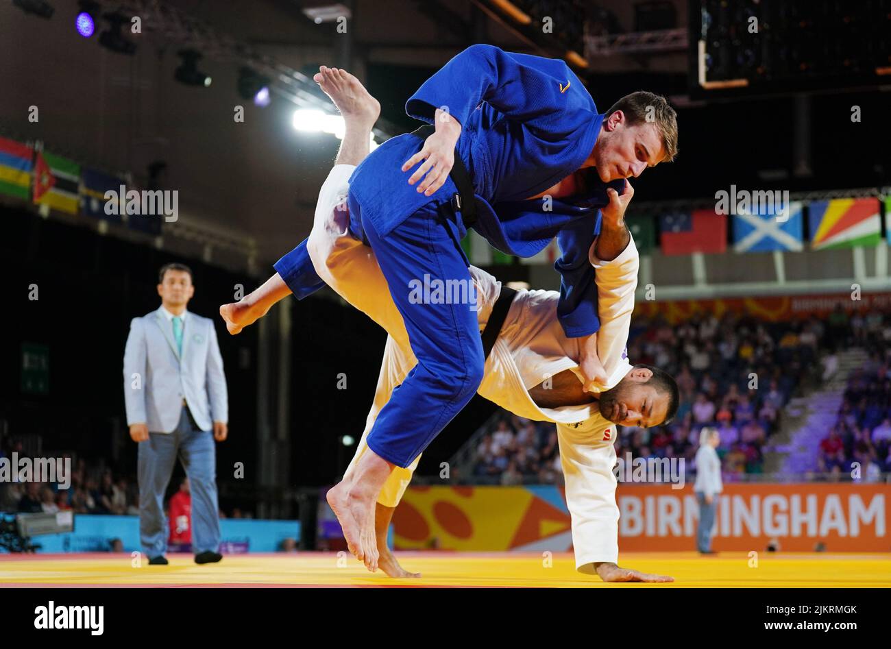 England's Rhys Thompson and Australia's Kayhan Ozcicek-Takagi in the ...