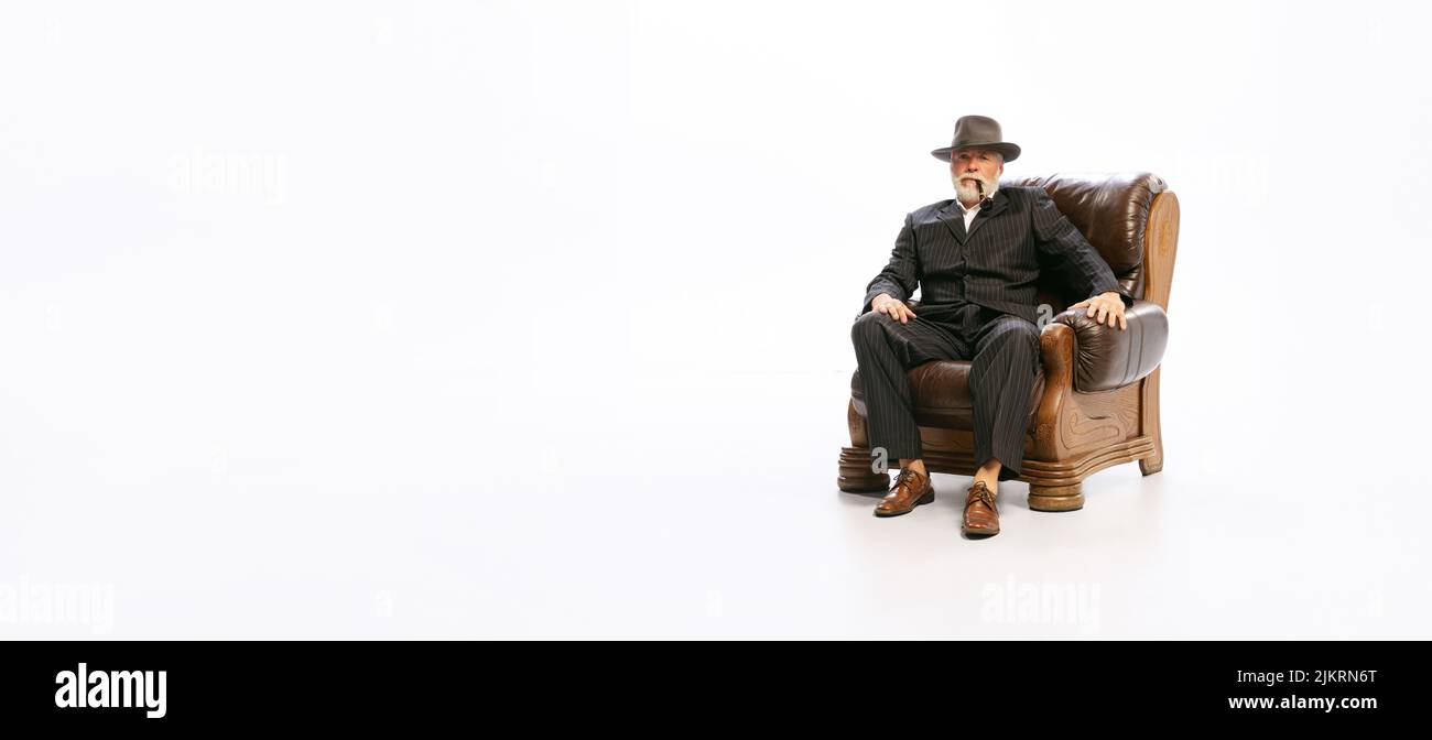 Portrait of stylish senior man in retro style clothes, vintage outfit ...