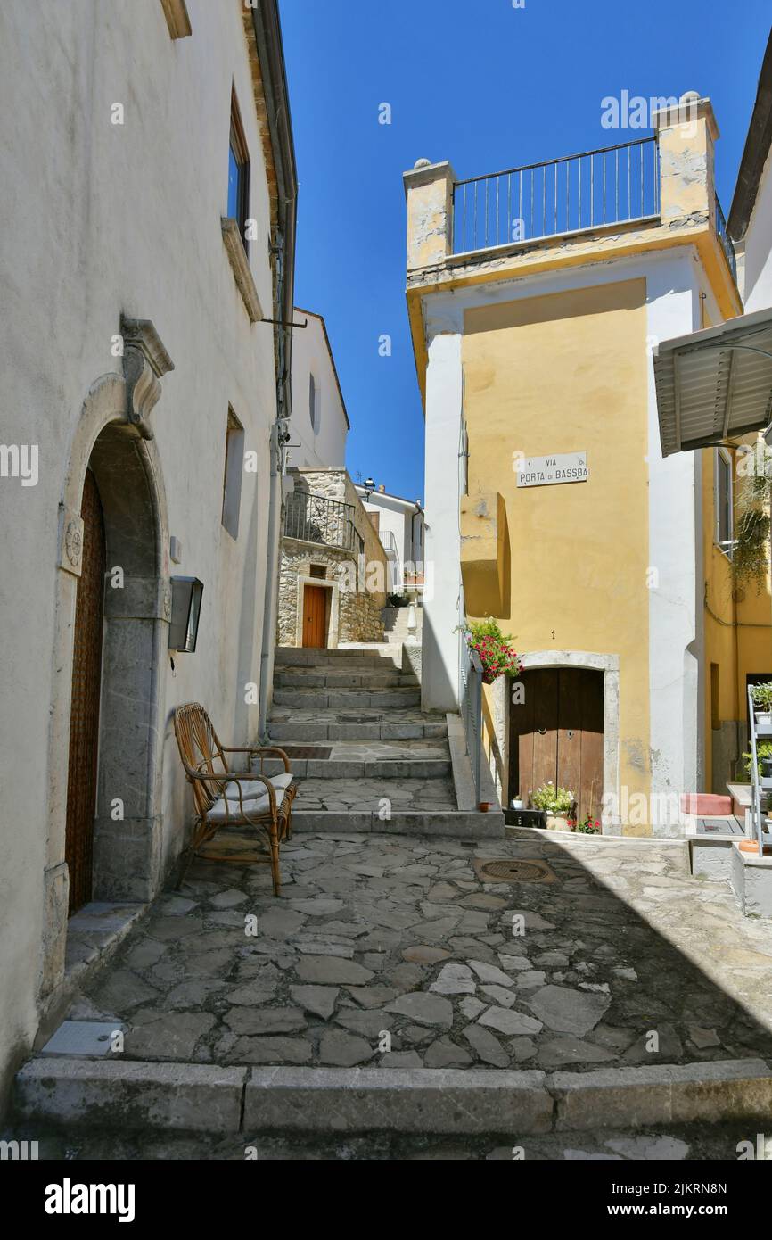 A small street between the old houses of Zungoli, one of the most ...