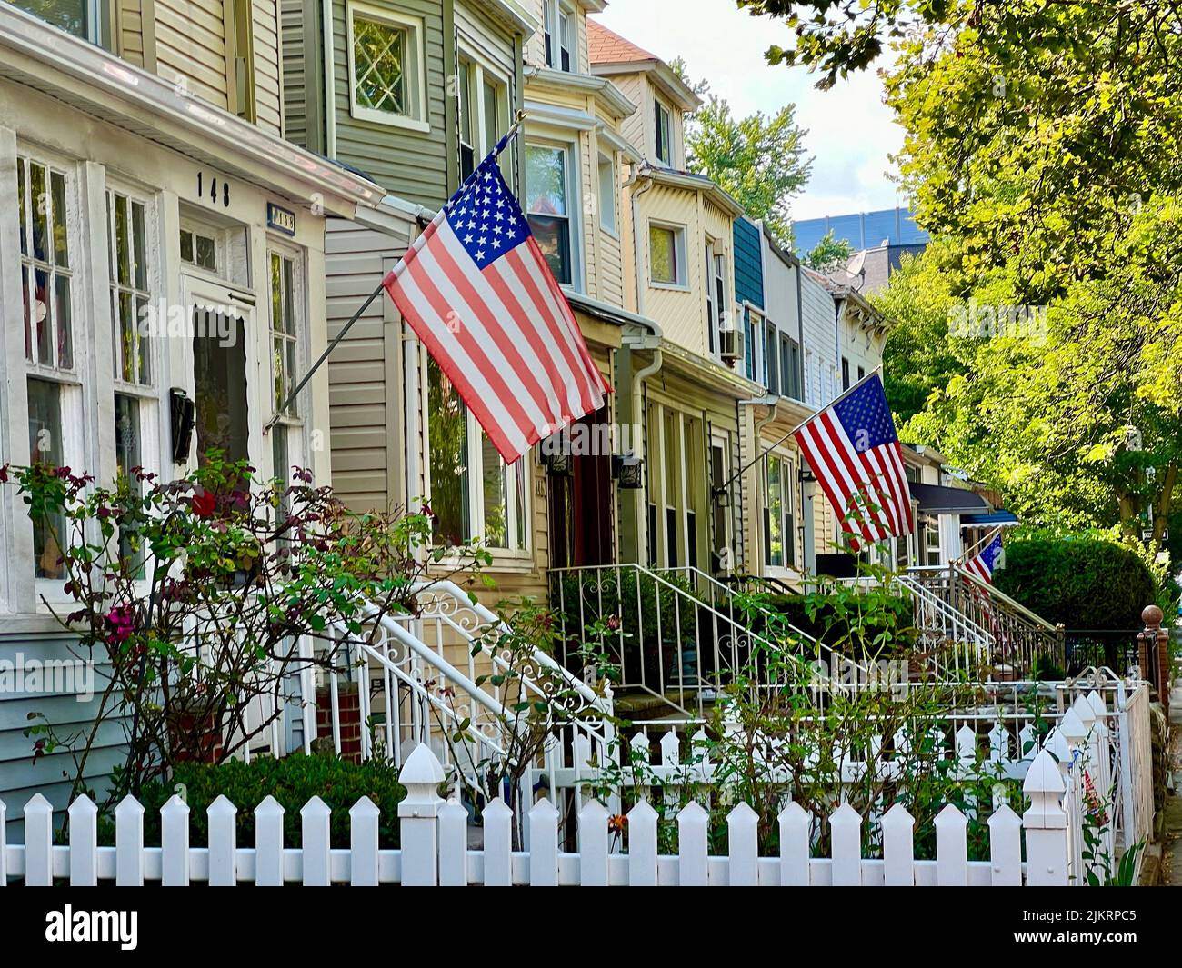 Working class homeowners display their patriotism by flying the ...