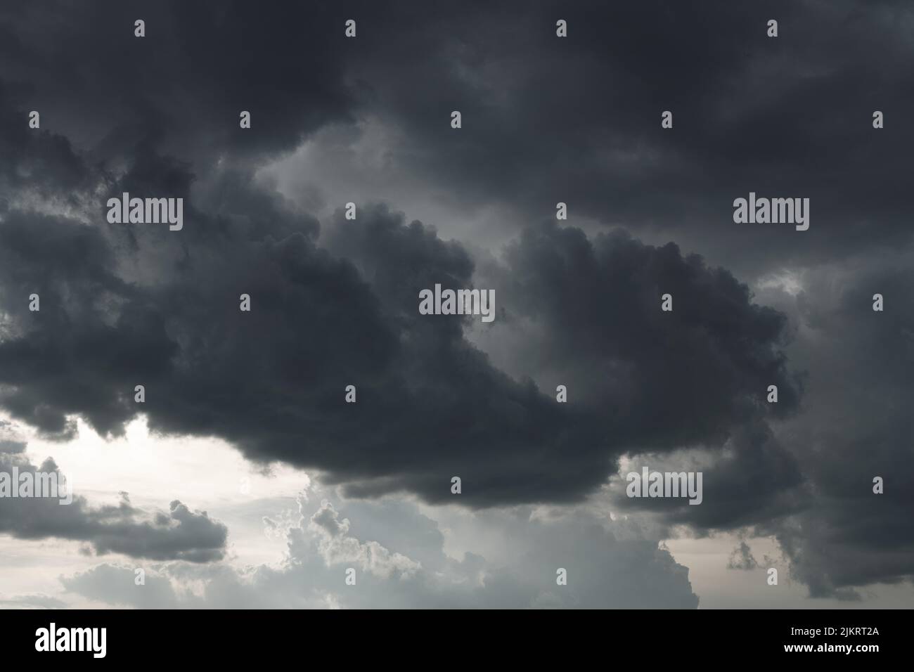 Overcast heavy sky with gray heavy clouds. Bad weather, dusk, typhoon ...