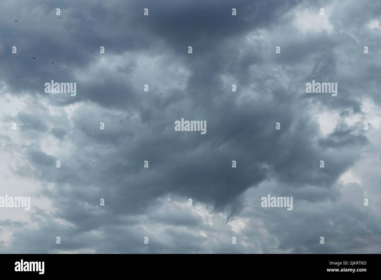Overcast heavy sky with gray heavy clouds. Bad weather, dusk, typhoon ...