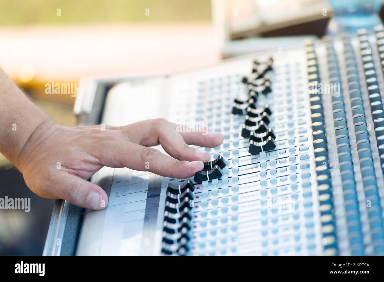 Sound Engineer Operating Professional Sound Mixer at Live Concert, Hand ...