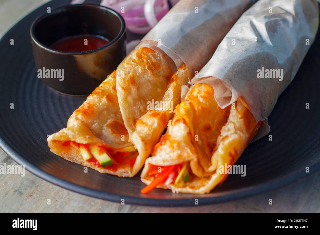 delicious Indian street food "egg rolls" is ready to eat Stock Photo ...