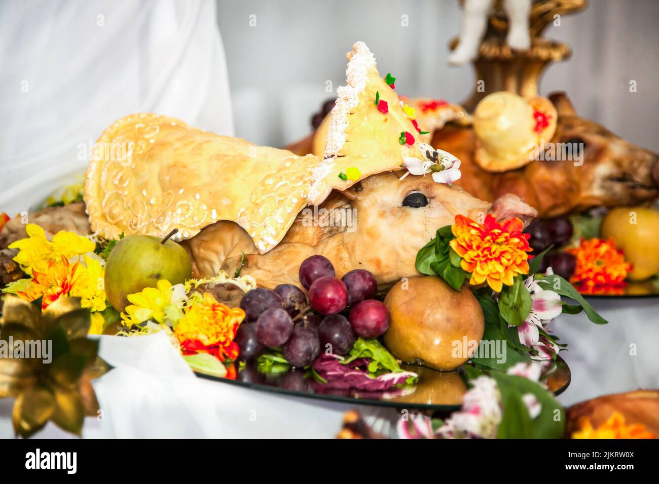 baked pigs in dough with fruit in buffet table with meat snacks Stock ...