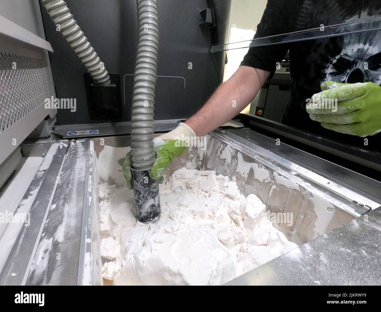 Engineer or artist designer printing 3D parts and shaping models from ...