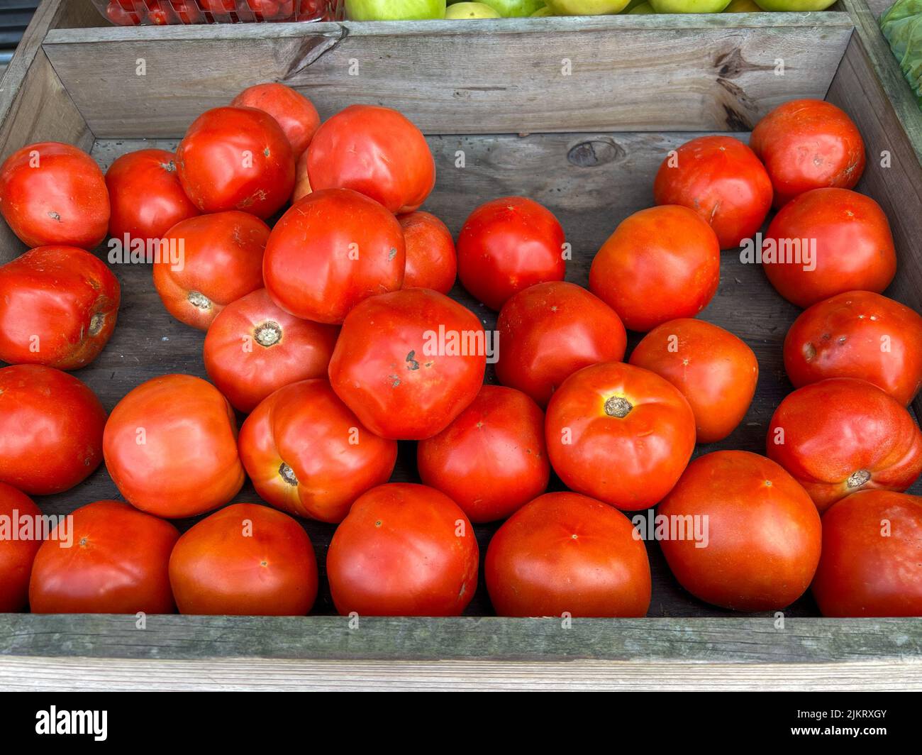 Bright red Florida tomatoes at a fruit and vegetable stand in Orlando ...