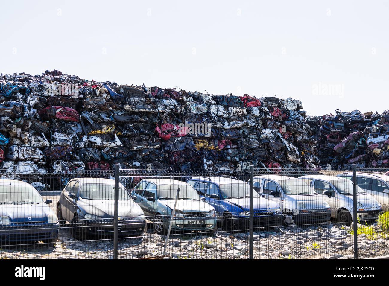 Car scrapyard with the pile of crushed and deformed cars. Oswiecim ...