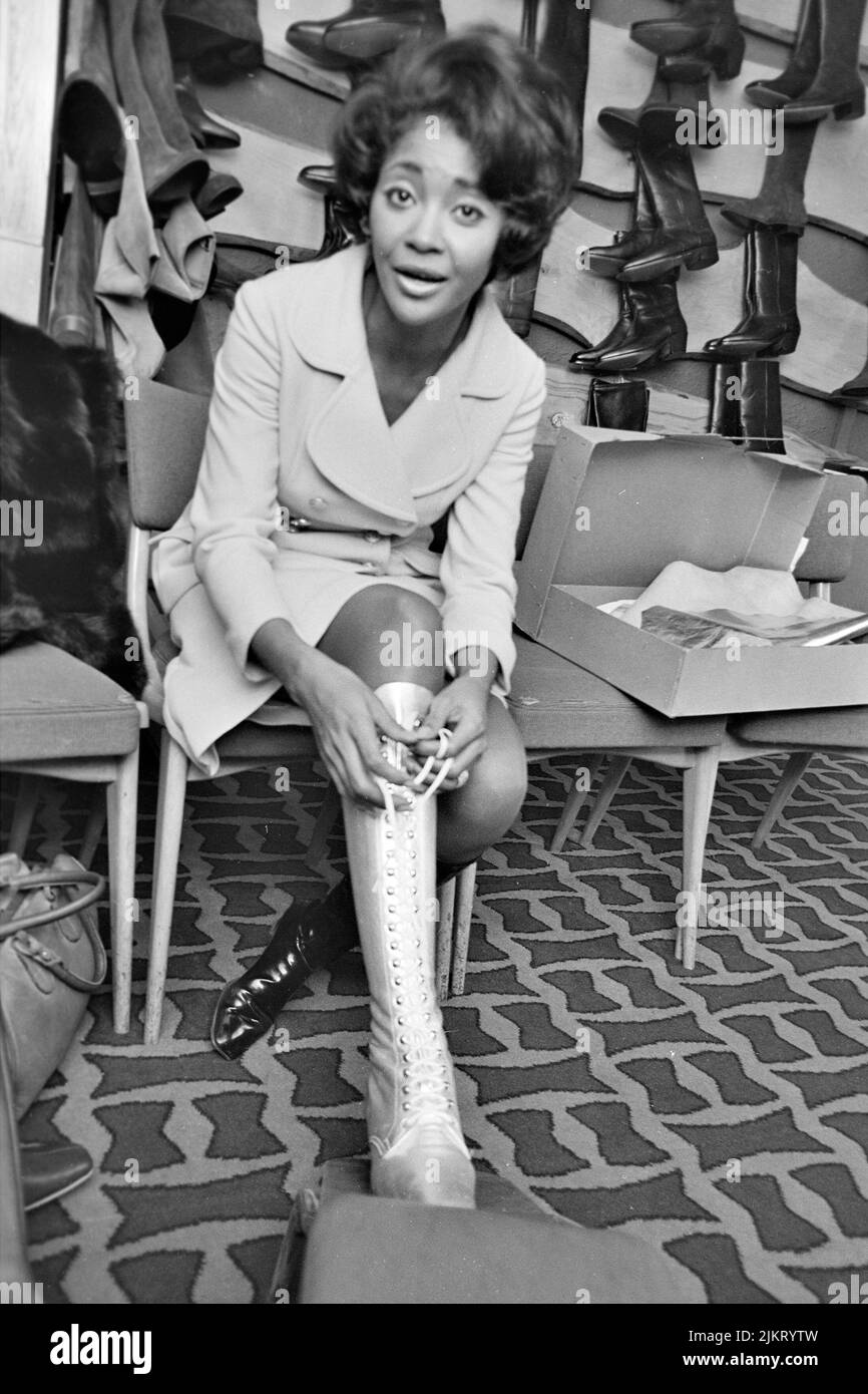NANCY WILSON (1937-2018) American singer shopping for boots on Oxford ... NANCY WILSON (1937-2018) American singer shopping for boots on Oxford ...