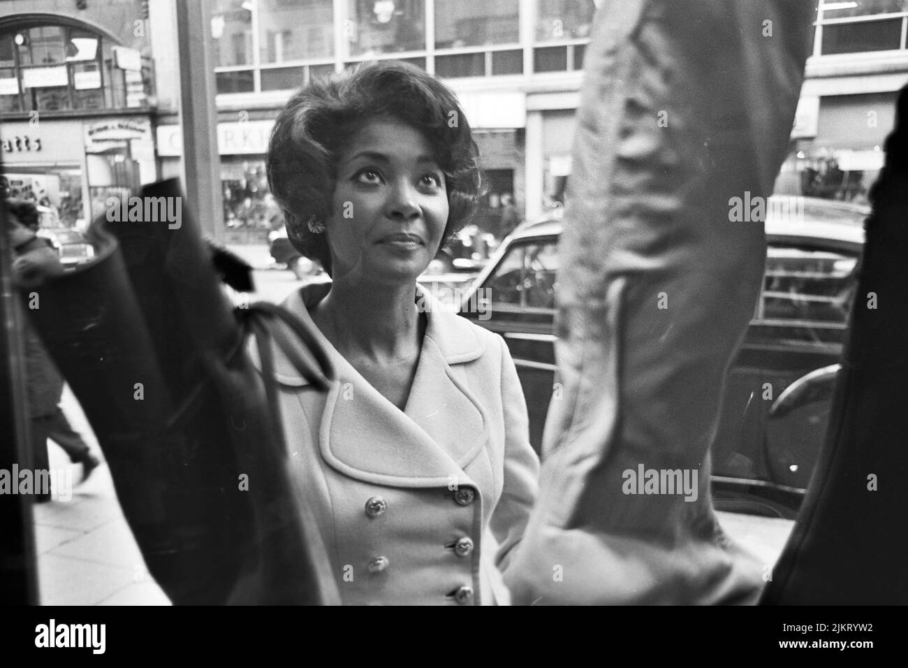 NANCY WILSON (1937-2018) American singer shopping for boots on Oxford ... NANCY WILSON (1937-2018) American singer shopping for boots on Oxford ...