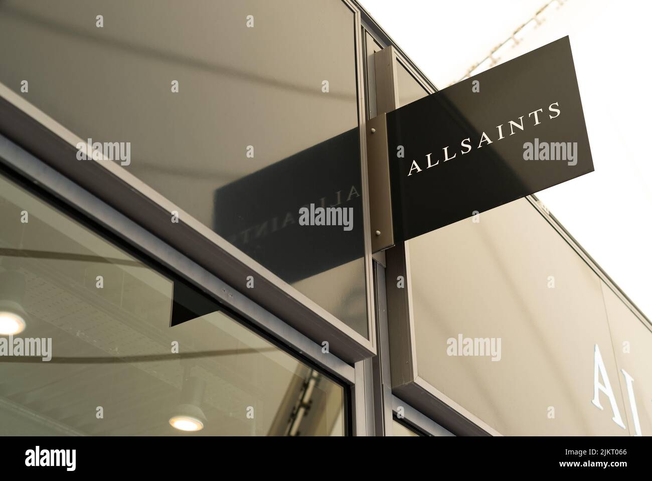 Close up of AllSaints British Fashion retail store entrance sign ...