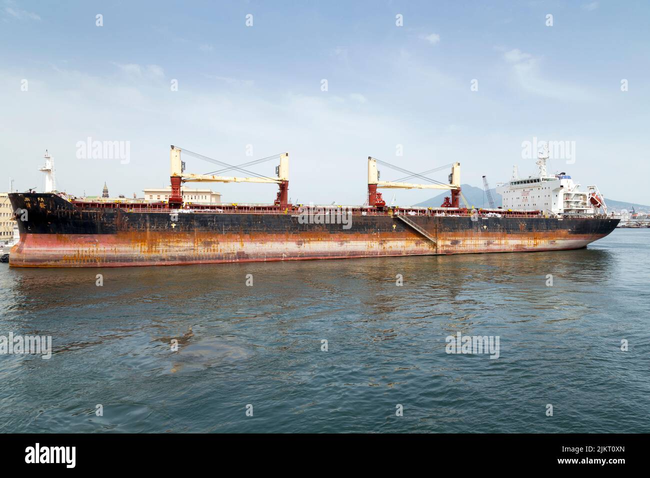 Old Rustic Cargo Ship docked at the Port of Naples, Italy, Europe Stock ...