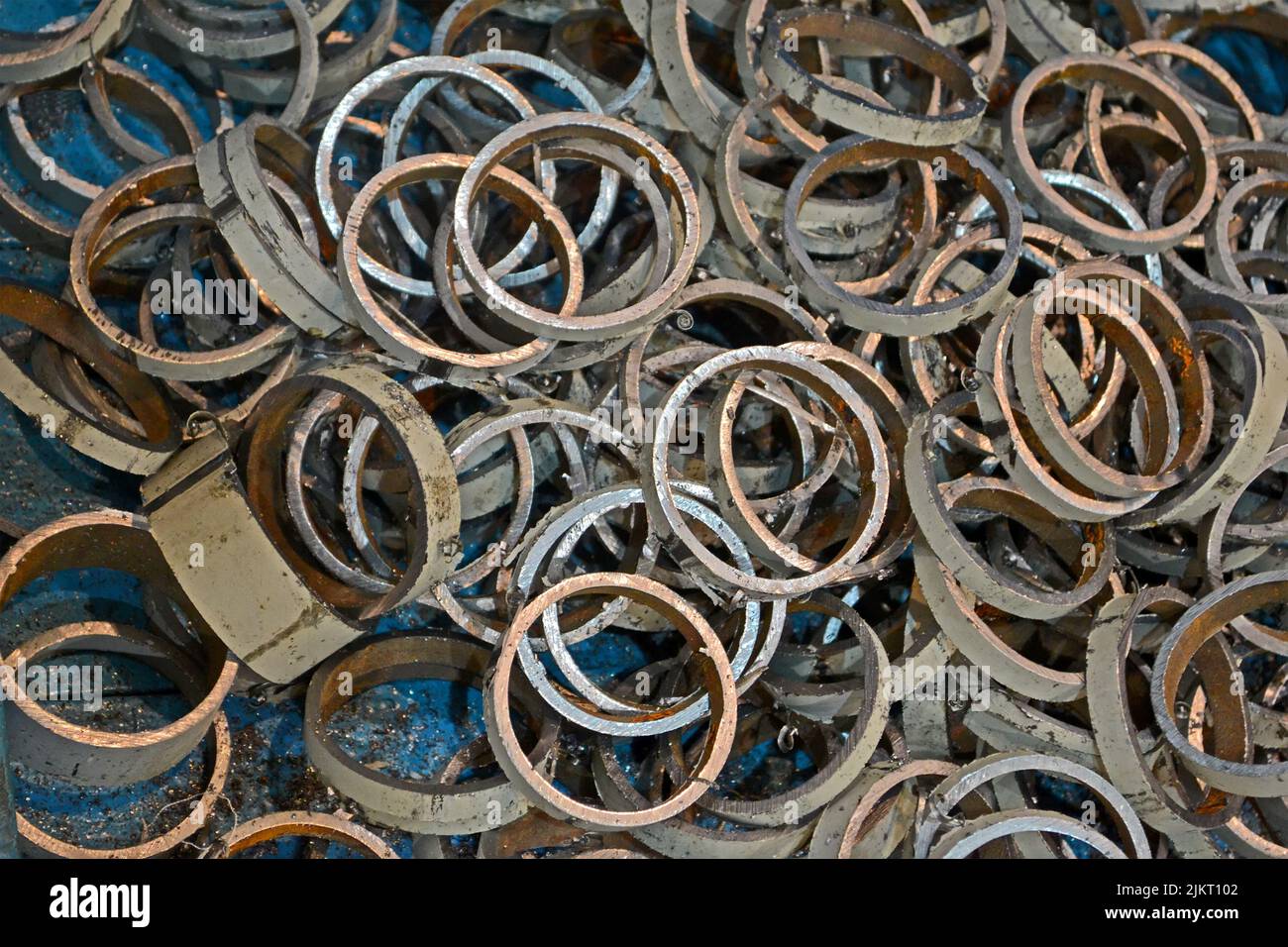 random metal rings heap closeup, modern industry diversity Stock Photo ...