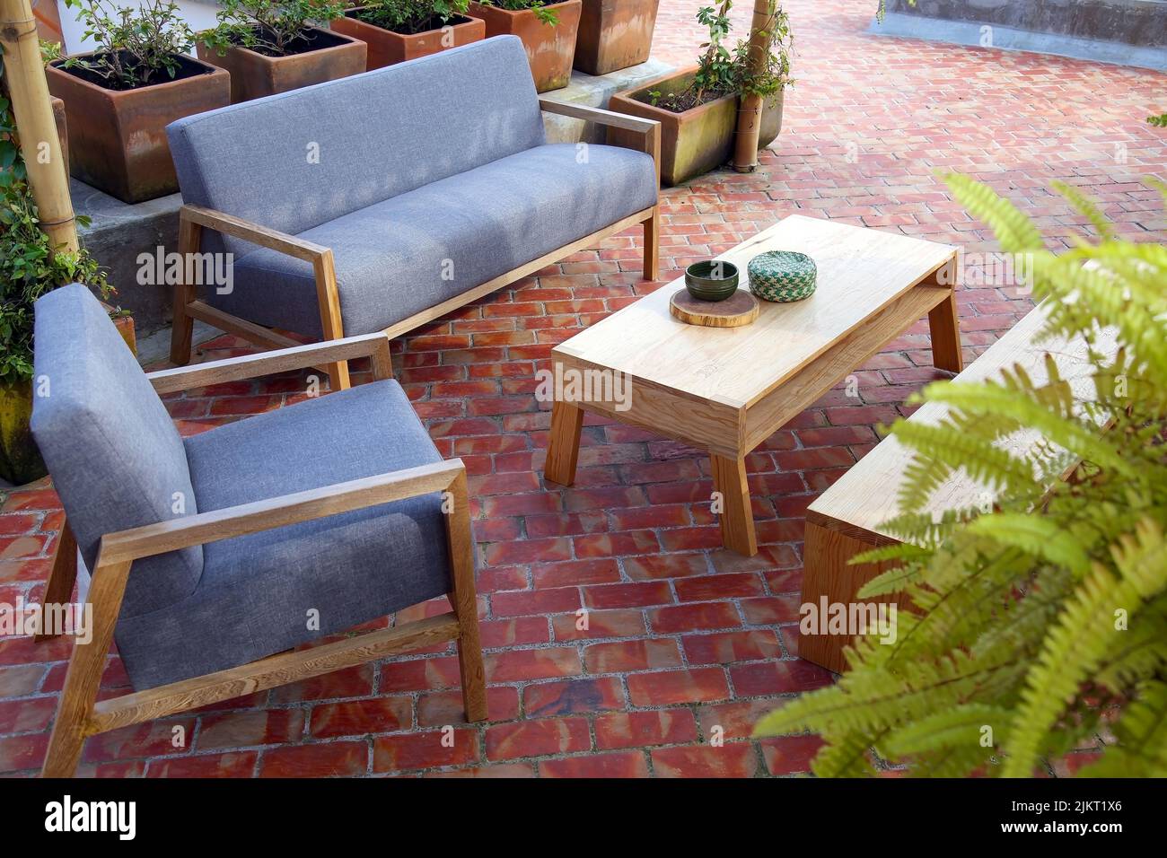 Patio. Garden. Urban, neutral, outdoor living space. Exterior photo ...