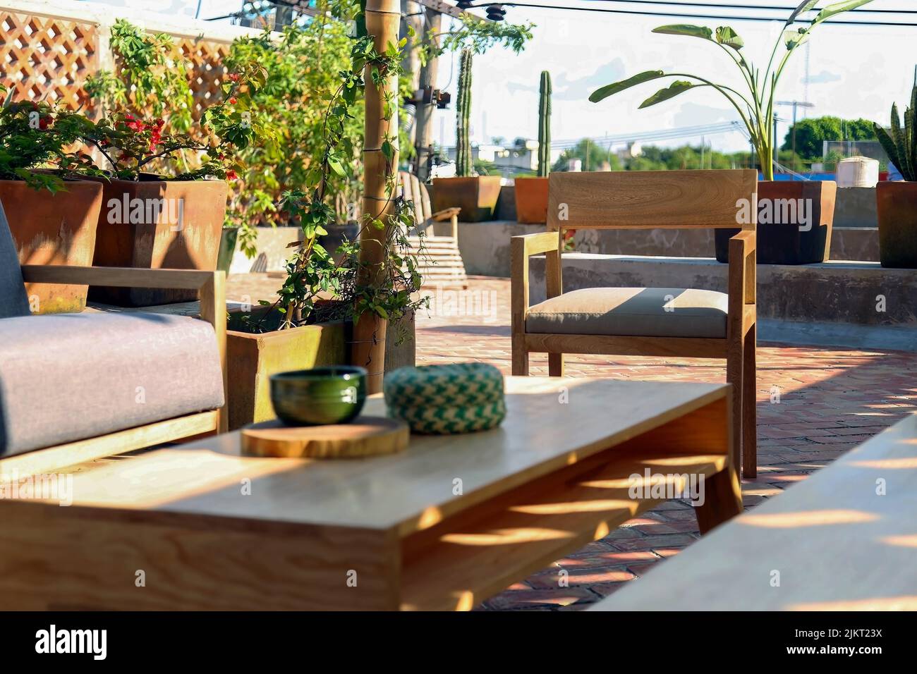 Patio. Garden. Urban, neutral, outdoor living space. Exterior photo ...