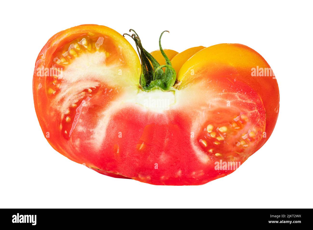 Cutted in half delicious and juicy fresh tomato isolated on a white ...