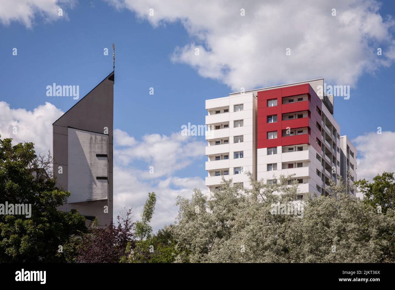 Parish Church of the Birth of Christ and high-rise building in Cologne ...