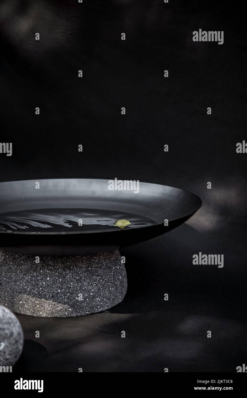 bowl with metal water and natural stone base, works as a water mirror ...