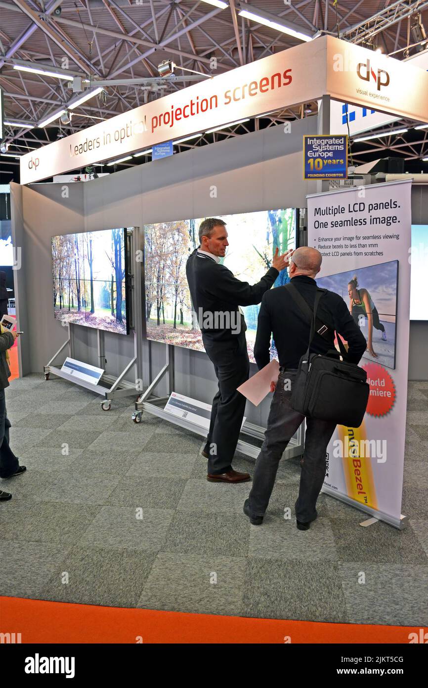 visitors test display wall at the Integrated Systems Europe (ISE ...