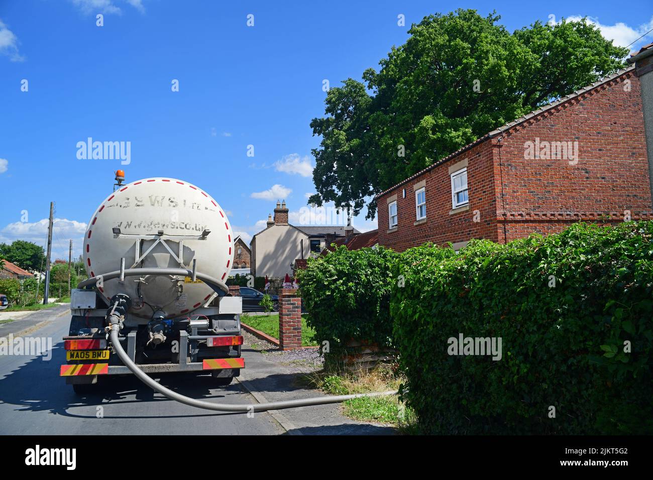 lorry emptying sewage from domestic septic tank united kingdom Stock ...