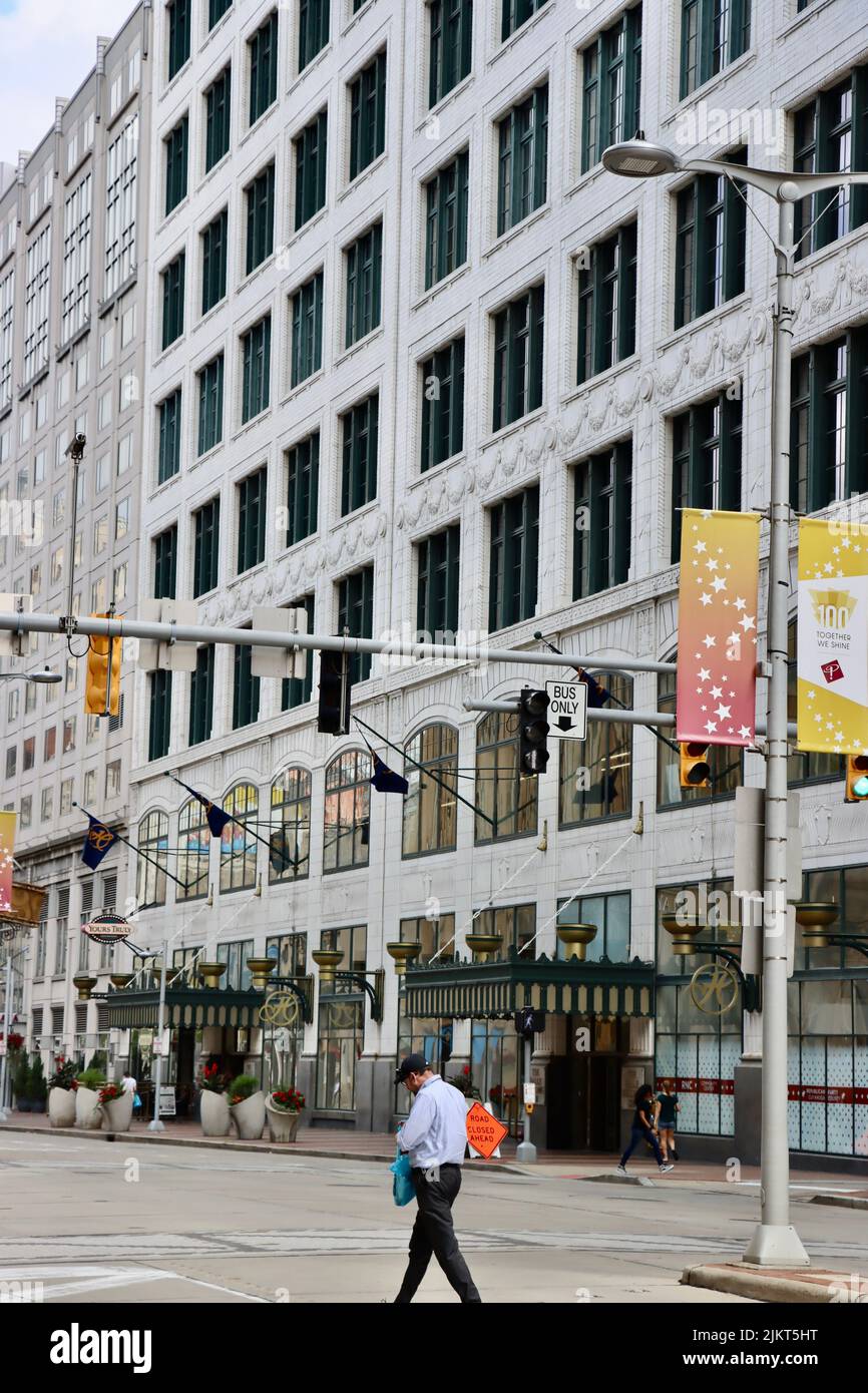 Man crossing Euclid avenue in downtown Cleveland, Ohio Stock Photo - Alamy