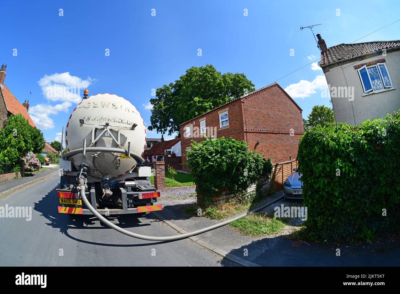 lorry emptying sewage from domestic septic tank united kingdom Stock ...