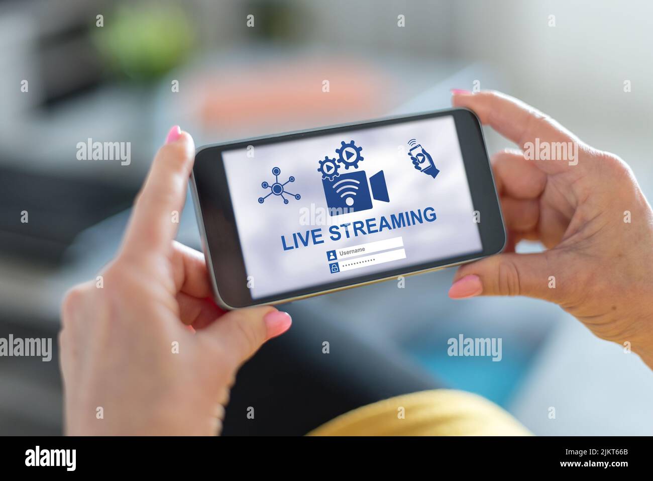 Smartphone screen displaying a live streaming concept Stock Photo - Alamy