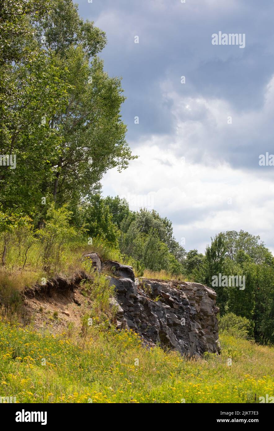 Rock and forest at Conroe Park in Huntsville Ontario with moody sky ...