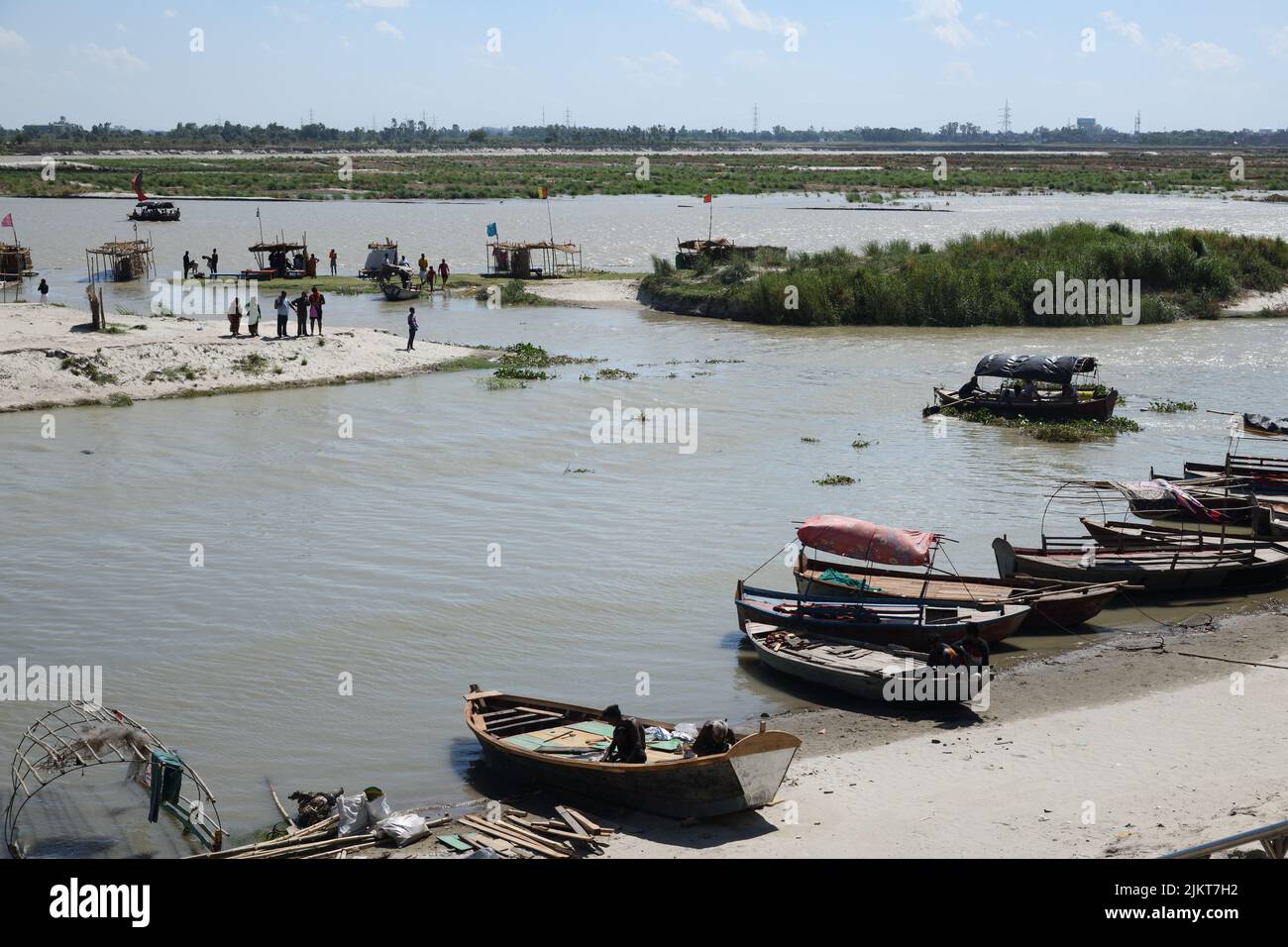 Daily life in the Ganges at Sarsaiya Ghat in monsoon. Kanpur, Uttar ...
